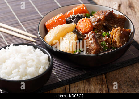 Kalbi Jim (Korean Braised Beef Short Ribs) closeup on a bowl ...