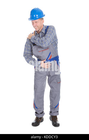 Mechanic Suffering From Back Pain On White Background Stock Photo - Alamy