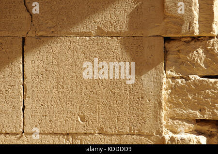 The Gortyn Code, or Great Code, carved on stones forming a wall, are ...
