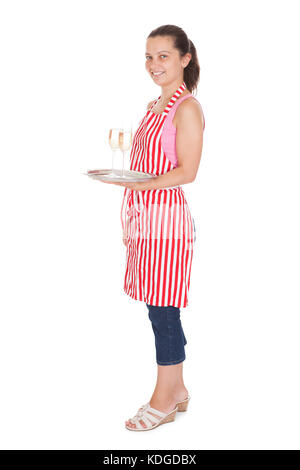 Female waiter carrying food on tray closeup. Customer service in ...