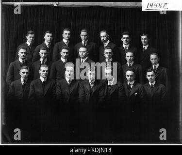 A 1915 group portrait of the Omega Psi Rho chapter, capturing ...