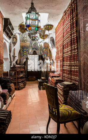 Tangier, Morocco - August 20, 2014: Young craftsman makes tiles for a ...