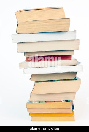 Books irregularly stacked Stock Photo - Alamy