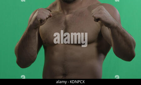 MMA fighter on a green screen. Muscular man on green screen. Green ...
