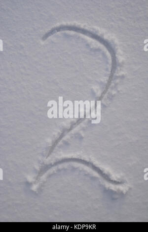 Winter numbers handwritten on snow background Stock Photo - Alamy