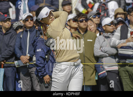 In Gee Chun, of South Korea, lines up her putt on the ninth hole during ...