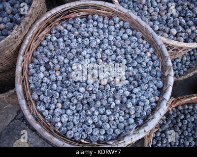 Baskets of bacaba fruit, acai cousin, being sold at acai market, in ...