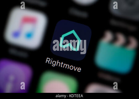 A close-up shot of the Rightmove app icon, as seen on the screen of a ...