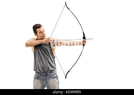 Young male archer aiming bow and arrow against gray background Stock ...