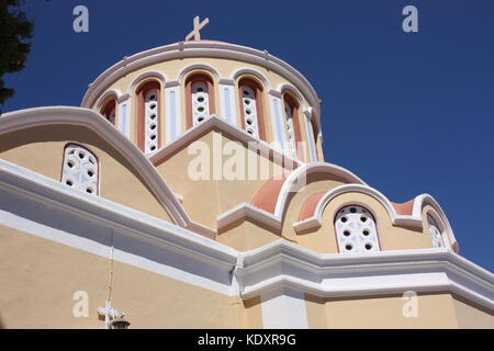 Greek Orthodox Church overlooking Harani Bay, Symi Town, Dodecanese ...