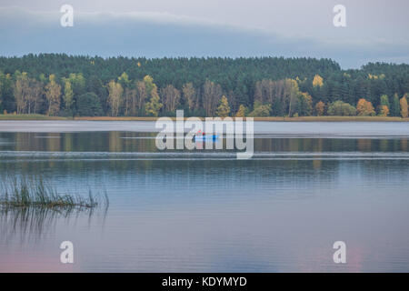 Lake in Riga, district Jugla. Autumn, yellow tree leaves, lake and ...