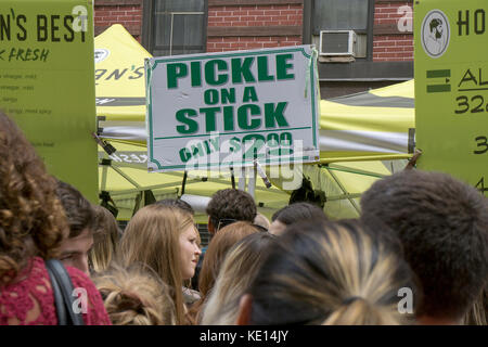 A sign for $2 pickles on a stick at the annual Pickle Day celebration ...