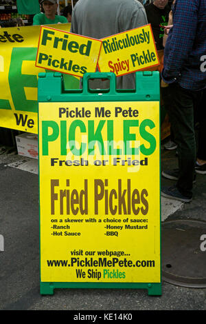 A sign for $2 pickles on a stick at the annual Pickle Day celebration ...