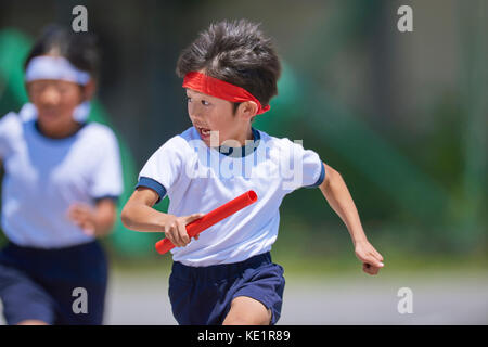 Japanese kids relay during school sports day in Japan Stock Photo - Alamy