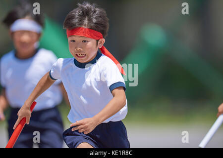 Japanese kids relay during school sports day in Japan Stock Photo - Alamy