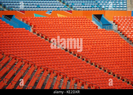 Bright orange football stadium seats. Horizontal shot Stock Photo - Alamy
