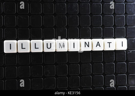 Illuminati text word photo illustration Stock Photo - Alamy