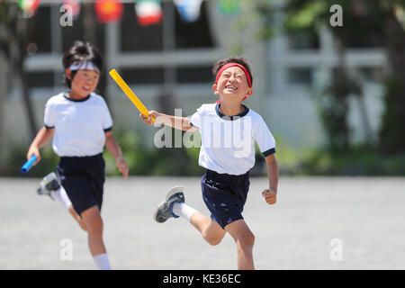 Japanese kids relay during school sports day in Japan Stock Photo - Alamy