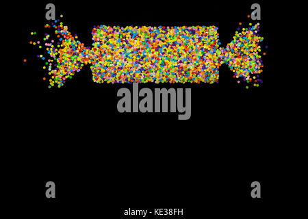 Candy, cracker of a festive colored confetti. Black background Stock ...