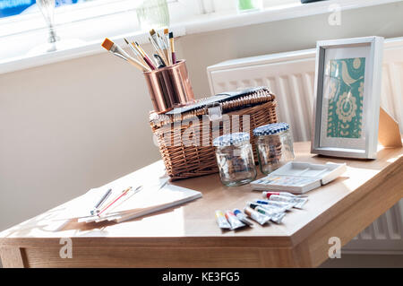 small crafting table in living space Stock Photo - Alamy