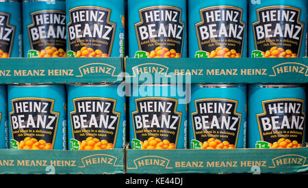 Tins of baked beans on a shelf at North Paddington foodbank waiting ...