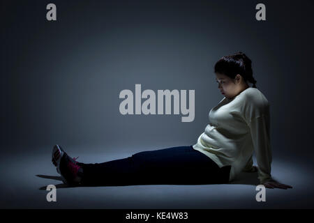 Fat woman gloomy going on diet Stock Photo - Alamy