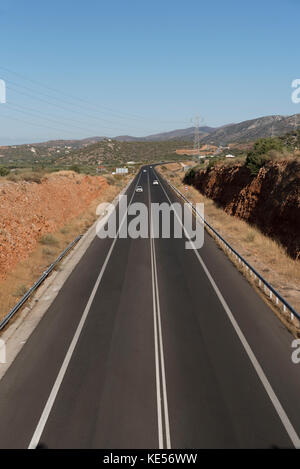 Malia, Crete, Greece. The E75 a National road with new road surface and ...