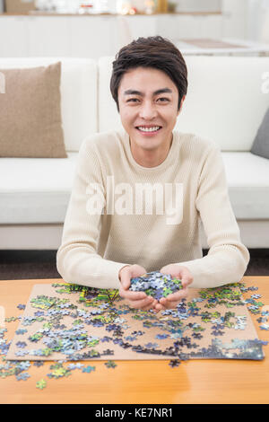 Portrait of smiling male kidult playing with a model airplane Stock ...