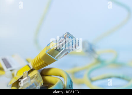 Yellow ethernet cable connector isolated Stock Photo - Alamy
