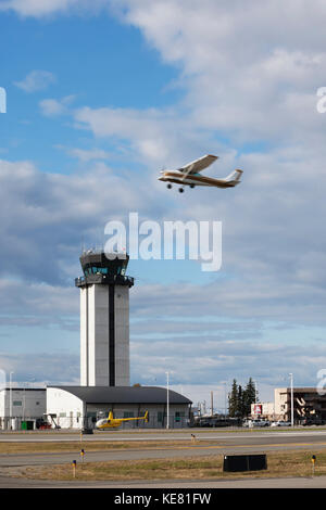 Cessna 150 In Flight At Merrill Field, Anchorage, Southcentral Alaska ...