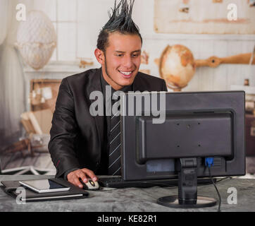 Close up of smiling office punk worker wearing a suit with a crest ...