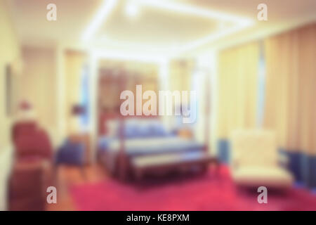 Blurred background bedroom in classic style interior Stock Photo - Alamy