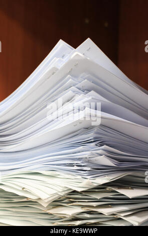 Stack of white papers fin storage box Stock Photo - Alamy