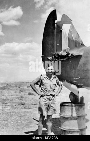 Alan Rawlinson & damaged Tomahawk 1941 (AWM P12424.052 Stock Photo - Alamy