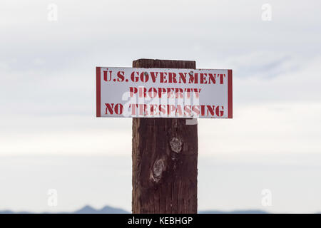 USA United States Government property no trespassing sign on fence of ...