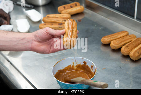 the pastry chef prepares pastries, close up Stock Photo - Alamy