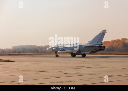 Military jet bomber Su-24 Fencer afterburner takeoff Stock Photo - Alamy