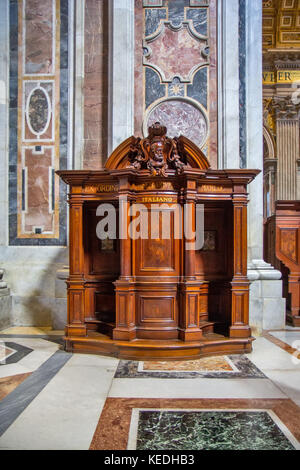 Old wooden confessional box, enclosed booth used for the Sacrament of ...