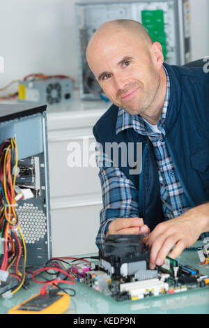 the small parts assembler Stock Photo - Alamy