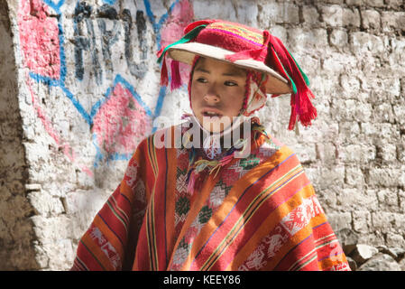 Peruvian Boy In Traditional Dress Playing A Wooden Flute Stock Photo ...