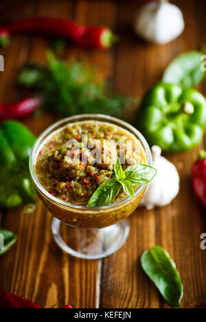 acute sauce of adzhika from various types of pepper Stock Photo - Alamy
