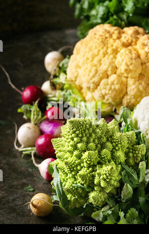 White cauliflower close up. Old rustic wooden table background Stock ...