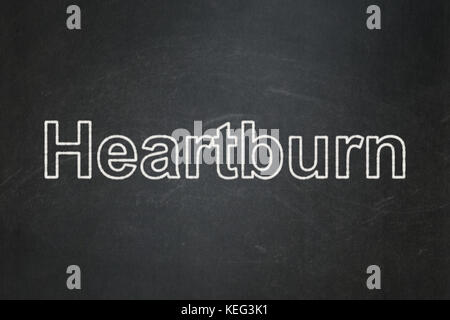 Medicine concept: Heartburn on School Board background Stock Photo - Alamy
