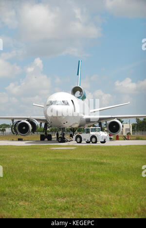 Old passenger jet airplane with missing engines Stock Photo - Alamy