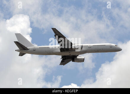 Unmarked passenger jet airplane side view Stock Photo - Alamy
