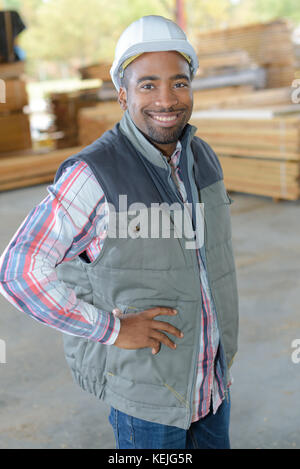 Portrait of woodyard worker Stock Photo - Alamy