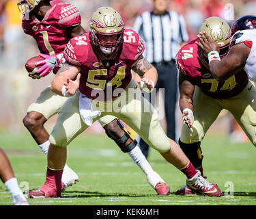 Florida State offensive lineman Jacob Rizy (64) sets up to block during ...