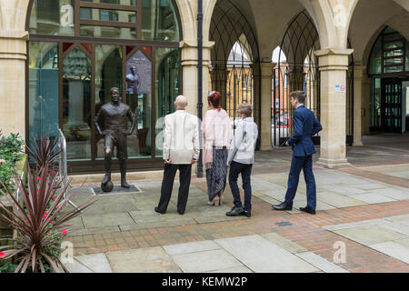 A statue of Walter Tull in courtyard of Northampton Guildhall; a ...