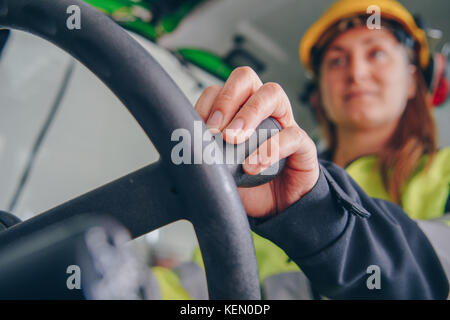 Woman operating heavy equipment Stock Photo - Alamy