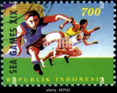 Southeast Asian Games 1997 stamp of Indonesia Stock Photo - Alamy